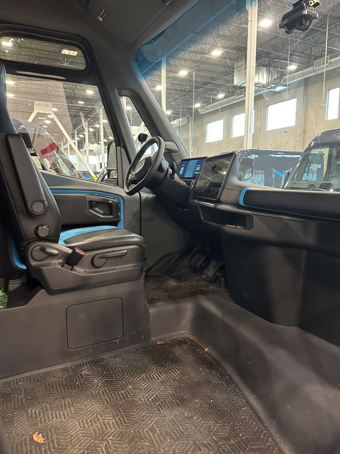 On the road with Amazon as it deploys first 50 Rivian 700 cargo vans in ...