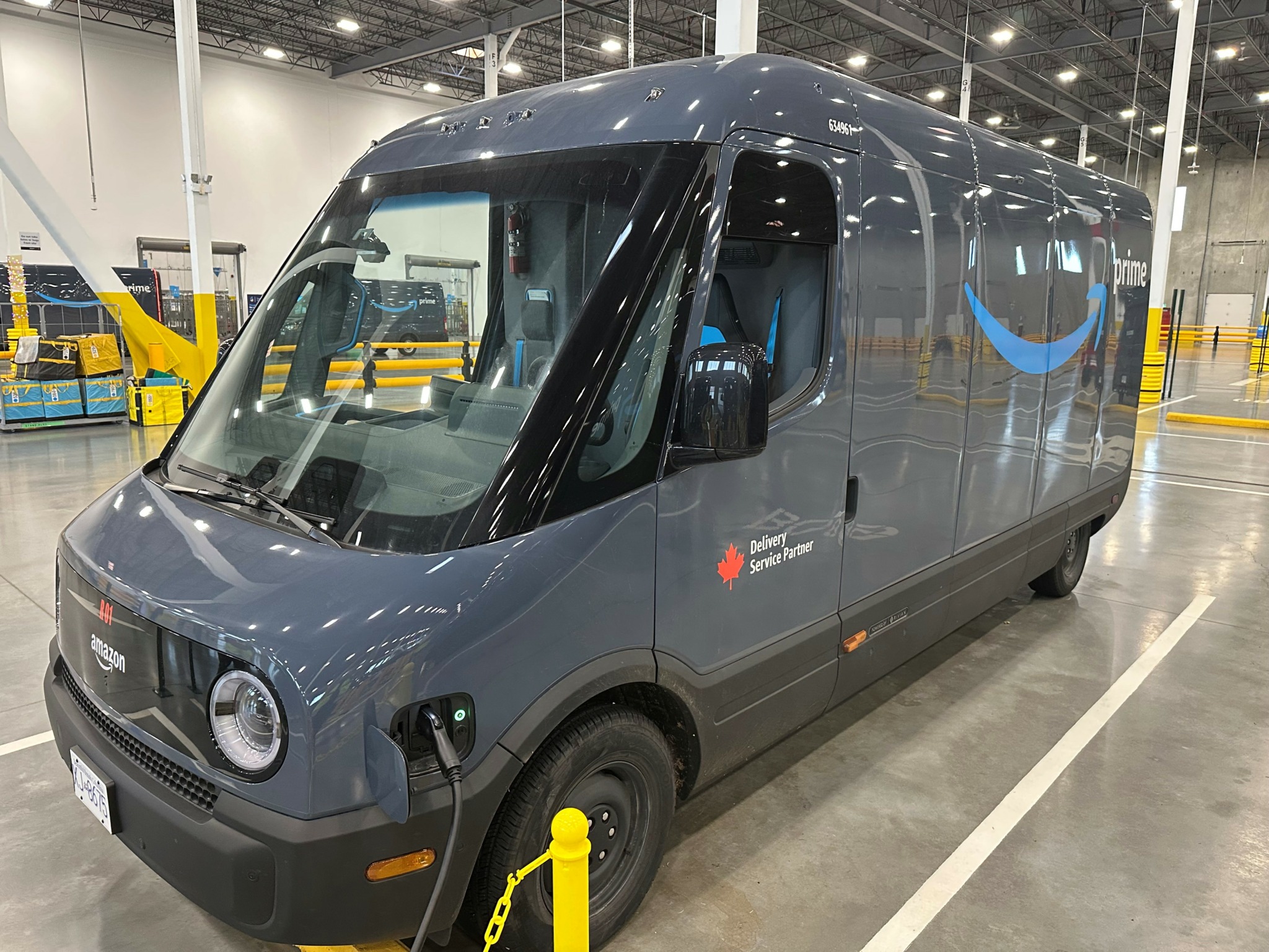 On the road with Amazon as it deploys first 50 Rivian 700 cargo vans in ...