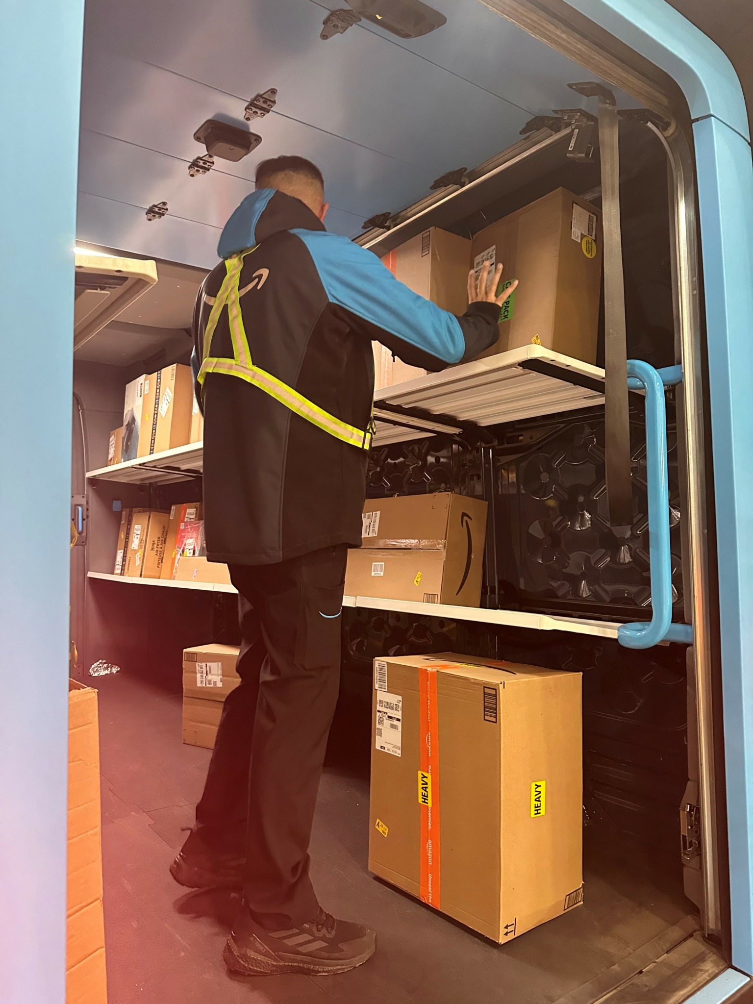 On the road with Amazon as it deploys first 50 Rivian 700 cargo vans in ...